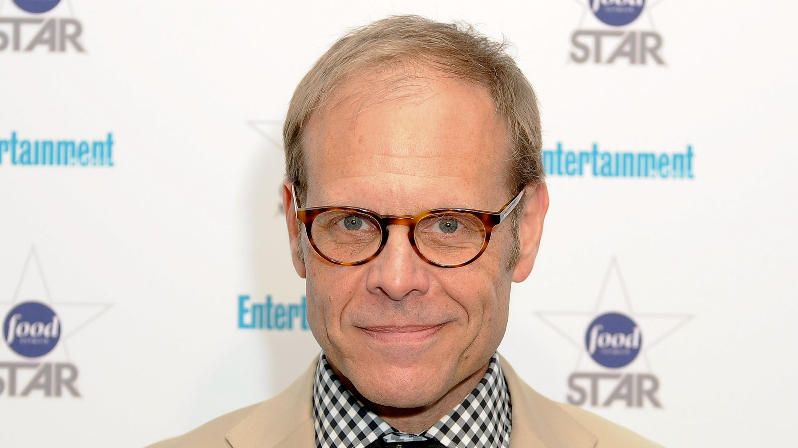 Alton Brown's Trick For Baby Back Ribs Will Make You Look Like A Chef