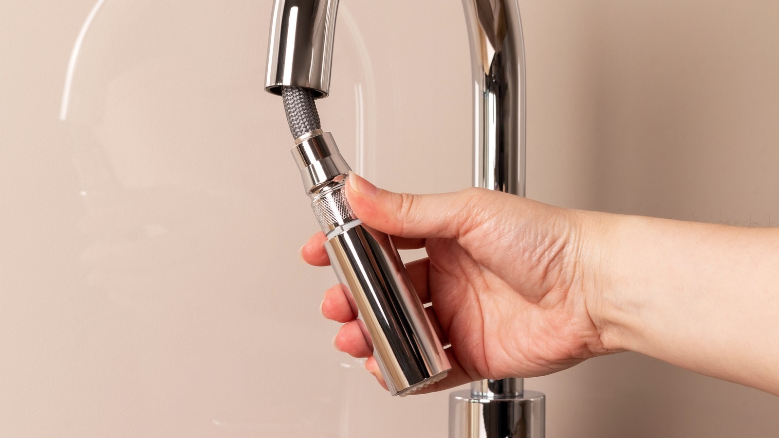 The Easiest Way To Clean Residue From Your Kitchen Faucet Head