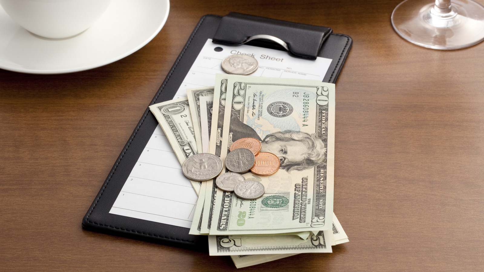 The Must-Know Etiquette For Tipping On Top Of A Restaurant's Service Fee