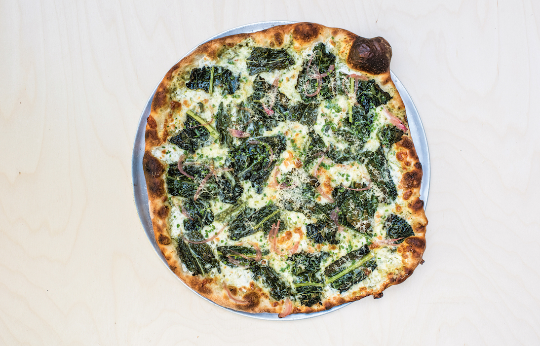 Dinosaur Kale Pizza With Pickled Red Onions, Hot From The Oven